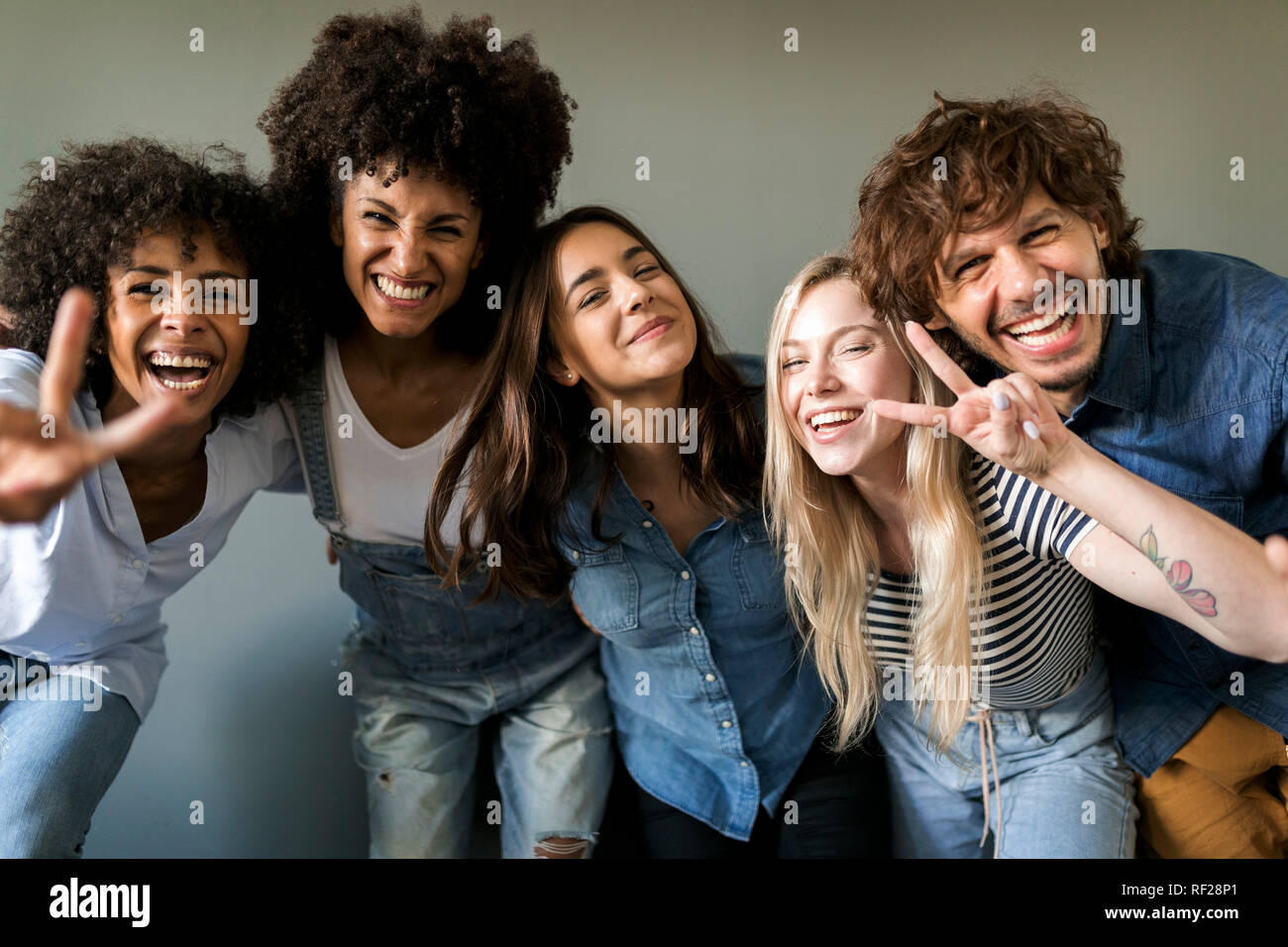 Group portrait of cheerful friends Stock Photo - Alamy