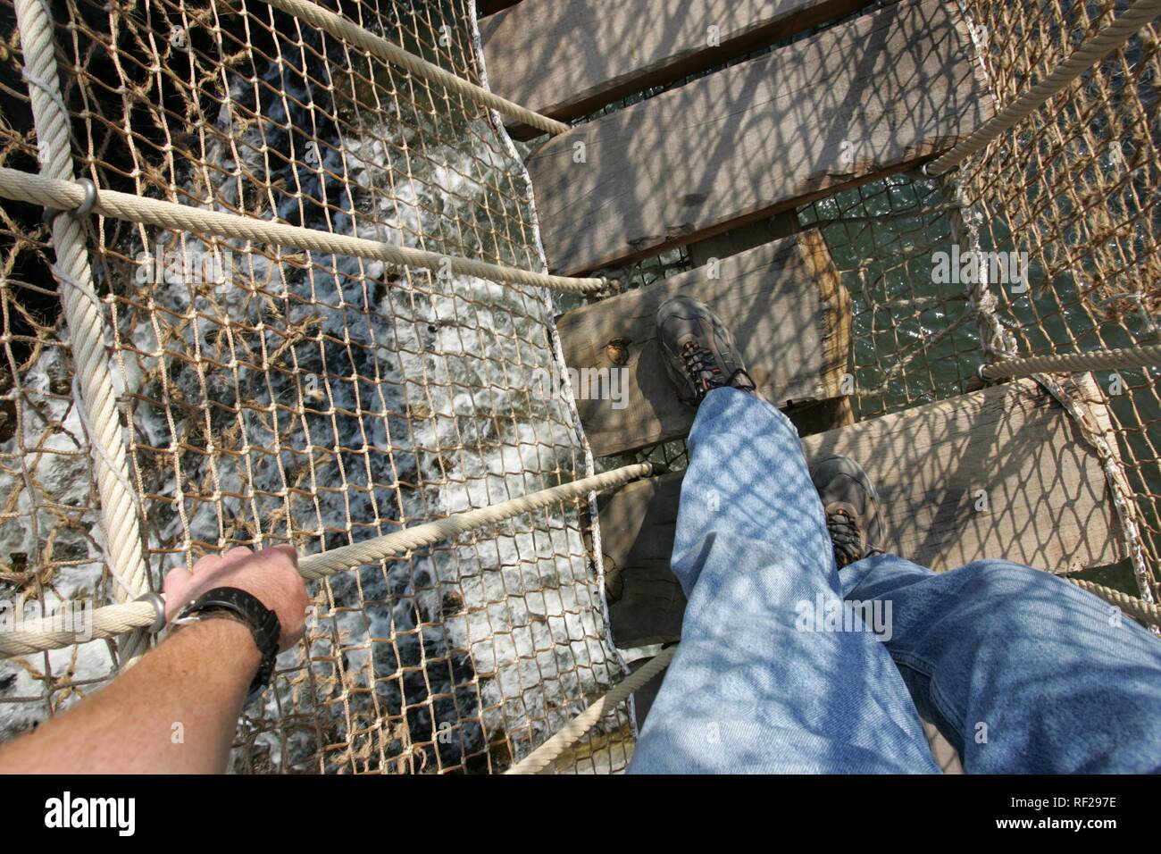 Suspension Bridge going over a river in the Kodiak Bear habitat, ZOOM ...