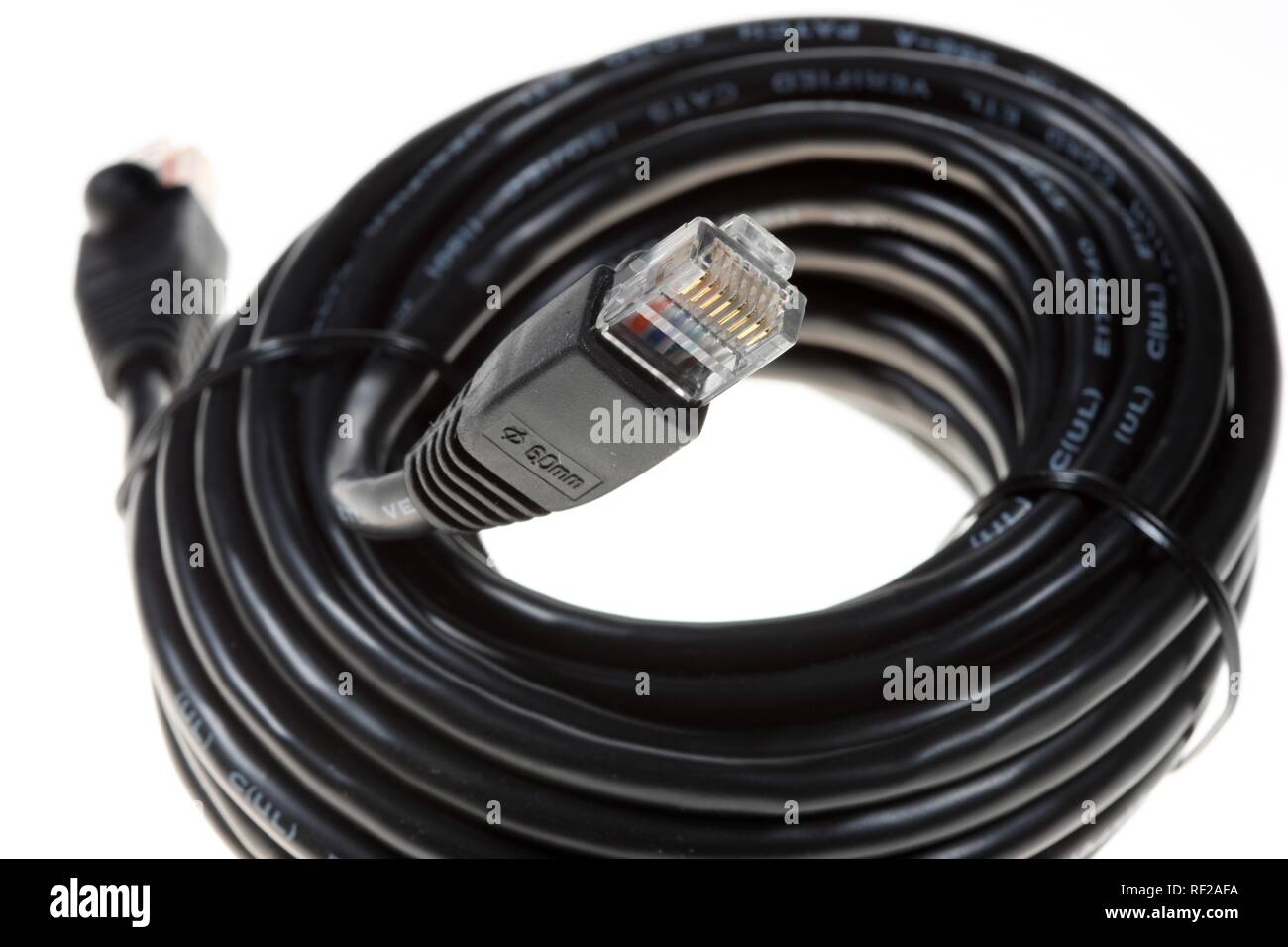Coiled computer network cables used to connect to an internal or ...