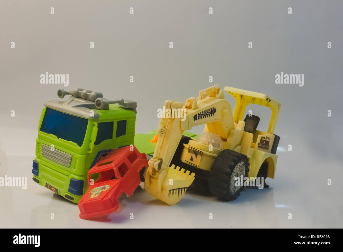 tractor truck toy kid car broken wheel vehicle isolated on white ...