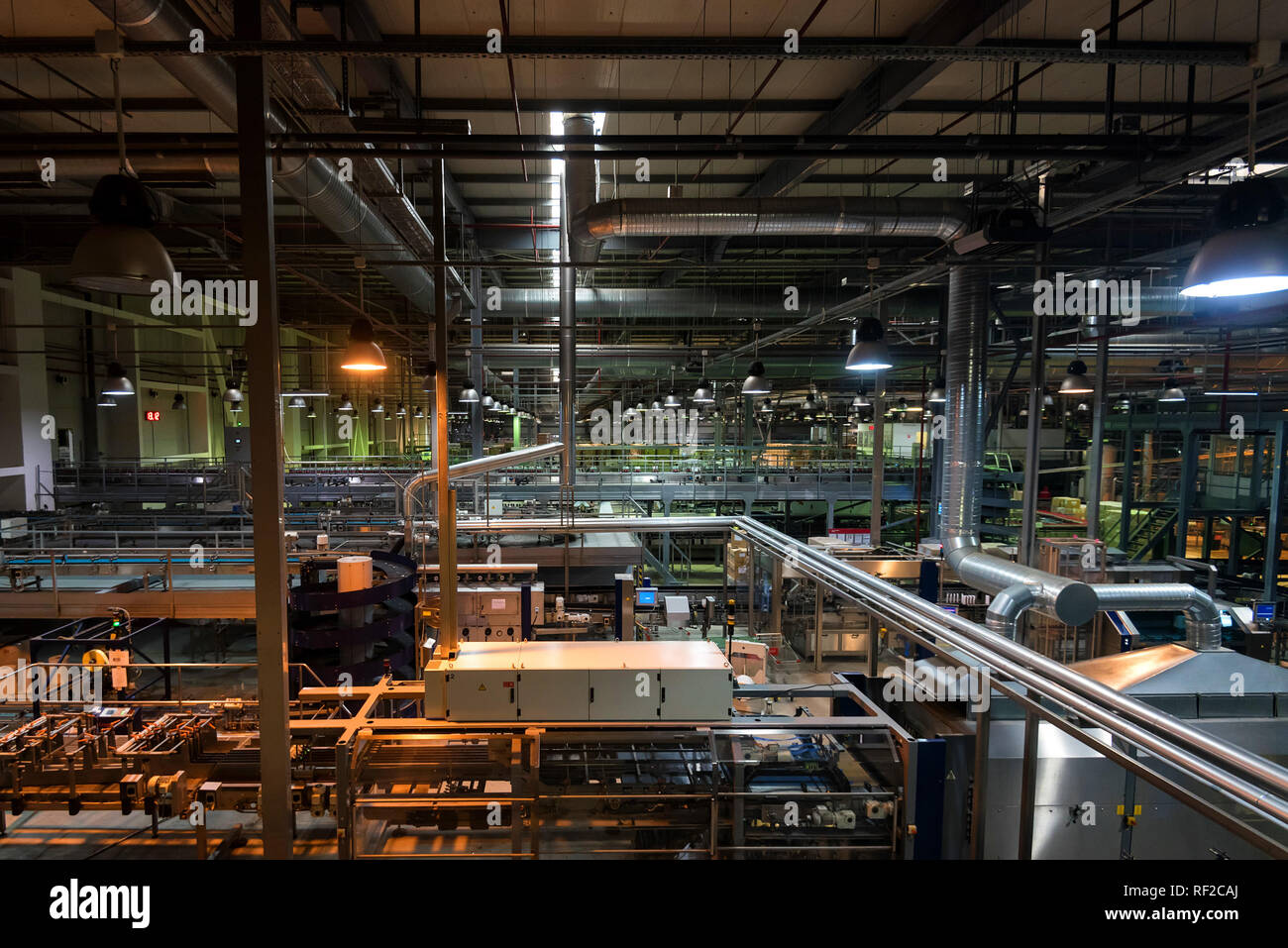 Industrial interior of soft drinks factory with tubes Stock Photo - Alamy
