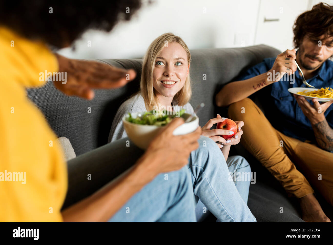 Talking eating hi-res stock photography and images - Alamy
