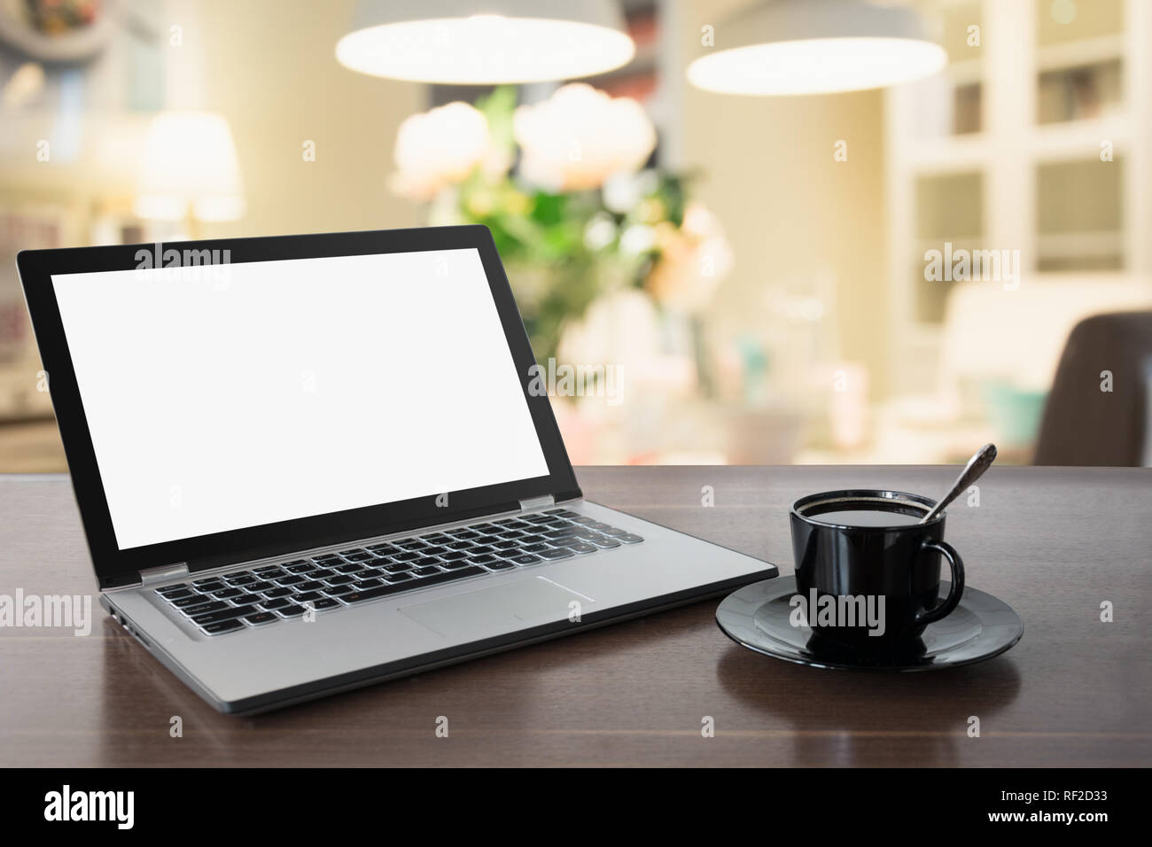 Laptop with blank screen with coffee on tabletop. Work at home. Coffee ...