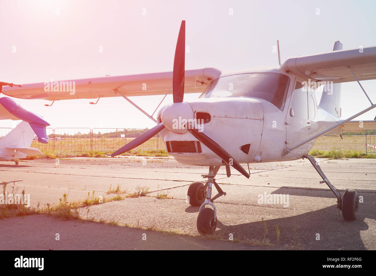 Light single-engine aircraft at the airport. Front view Stock Photo - Alamy