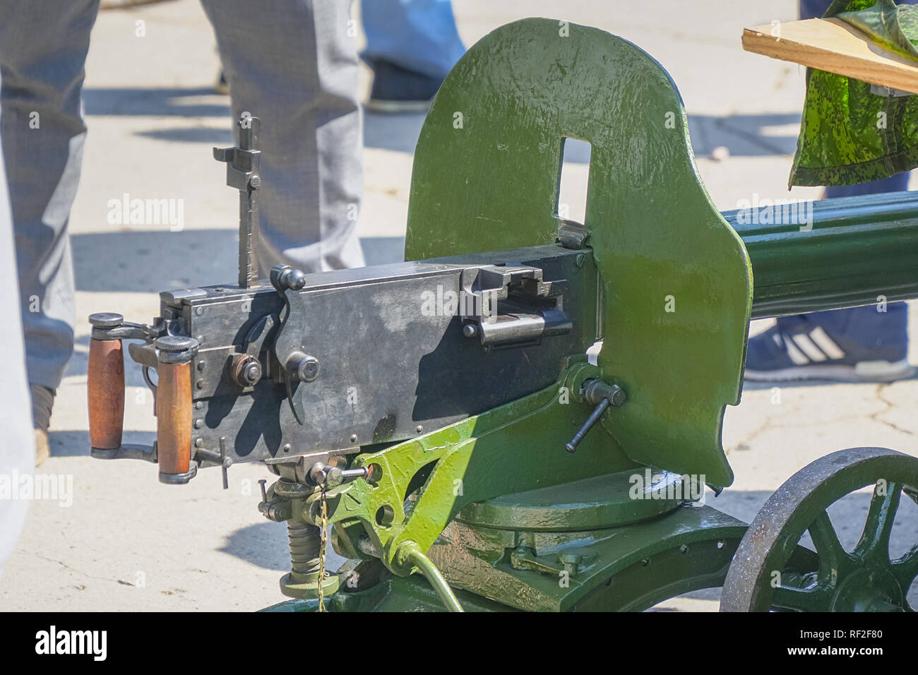 Old machine gun green on a natural background Stock Photo - Alamy