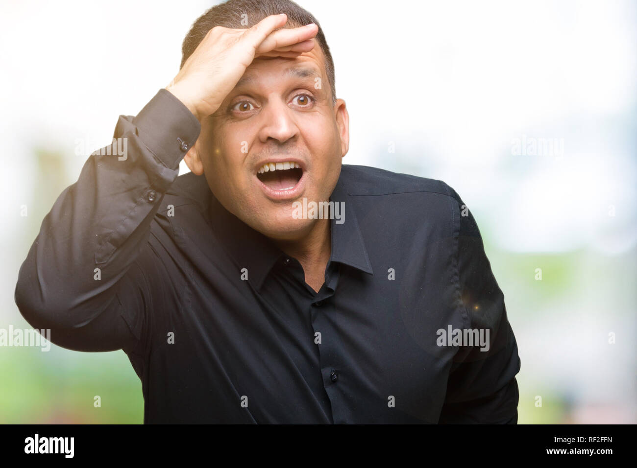 Handsome middle age arab business man over isolated background very ...