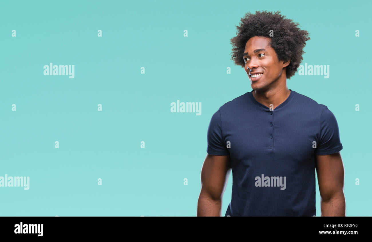 Afro american man over isolated background looking away to side with ...