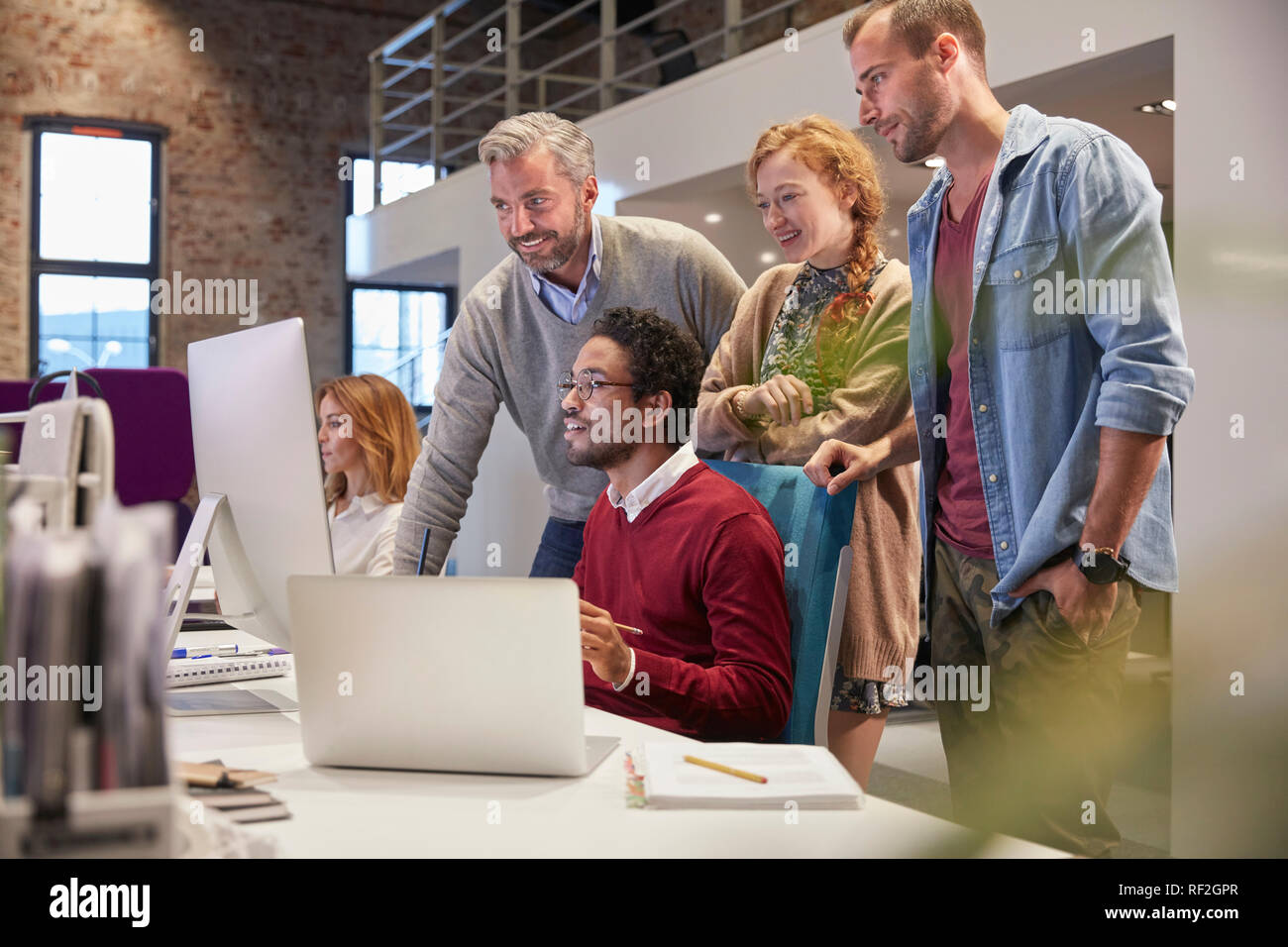 Looking over shoulder at computer hi-res stock photography and images ...