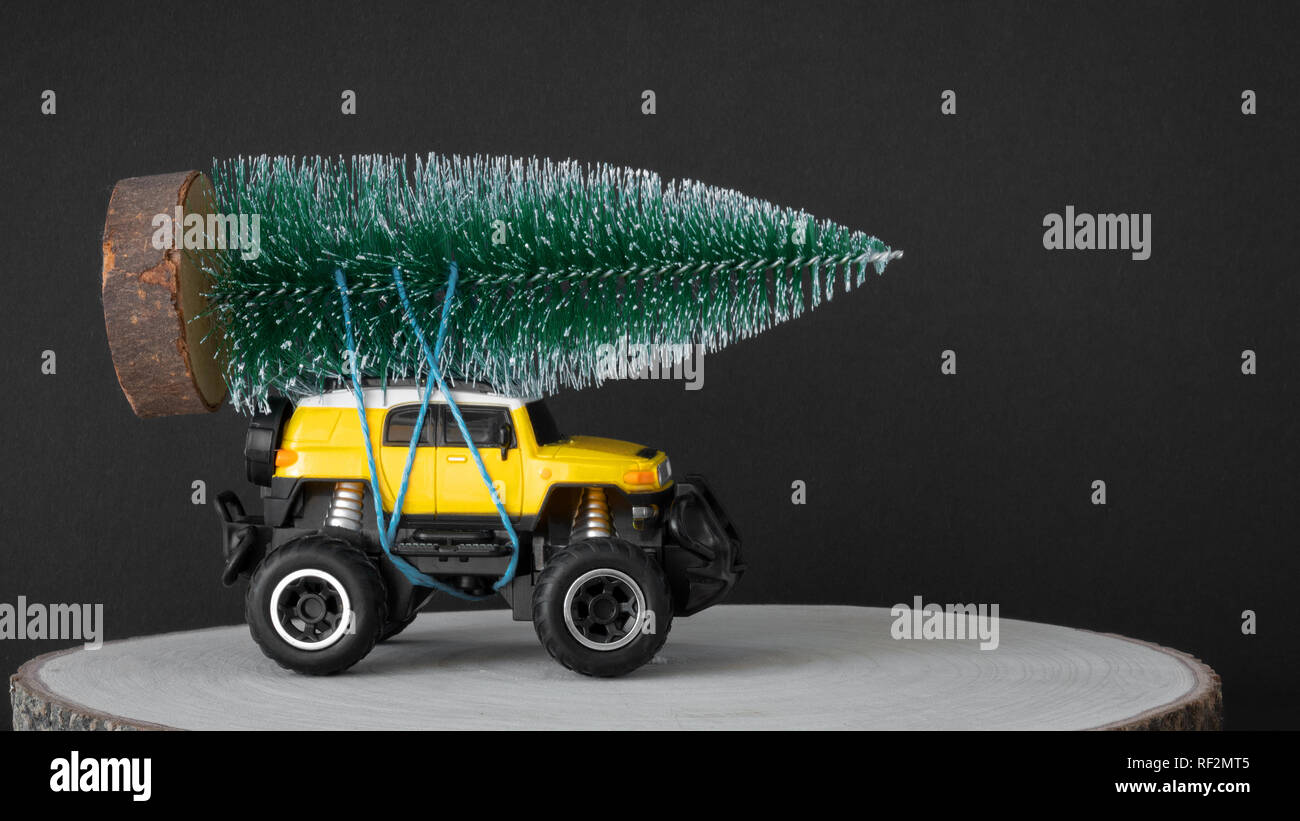 Toy car miniature fir tree hi-res stock photography and images - Alamy
