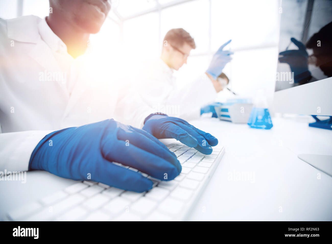 Scientist research computer keyboard hi-res stock photography and ...