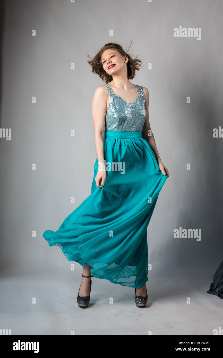 Pretty blonde girl dressing hi-res stock photography and images - Alamy