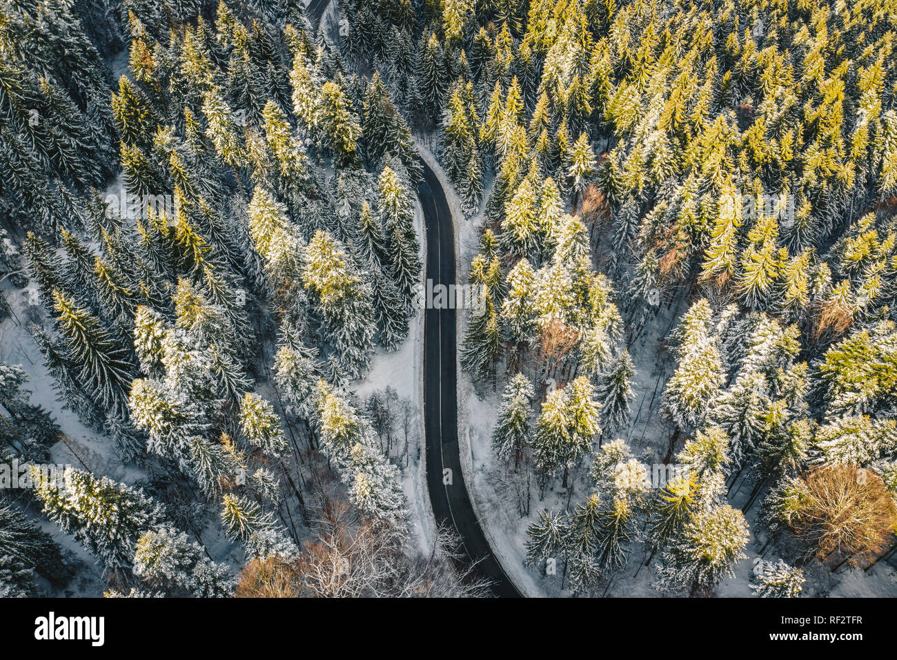 Highway in snowed mountains hi-res stock photography and images - Alamy
