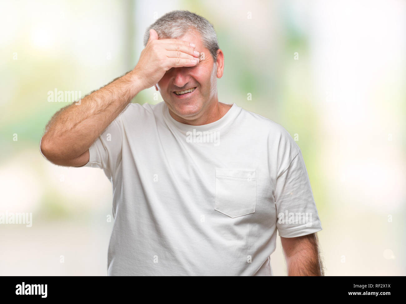 Handsome senior man over isolated background smiling and laughing with ...