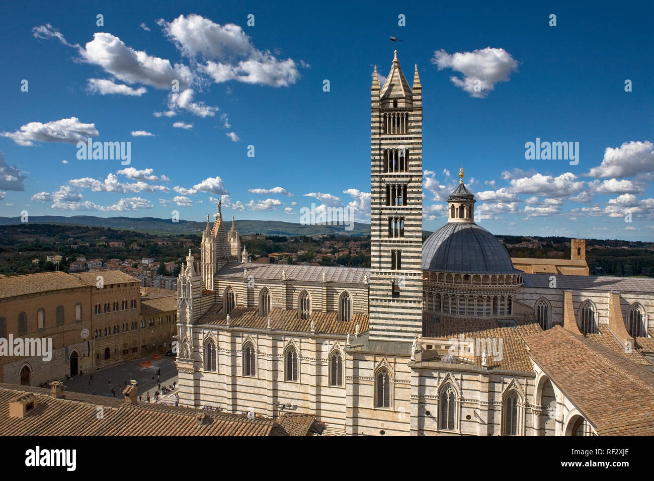 The campanile and dome of Siena's cathedral, seen from the "Facciatone ...