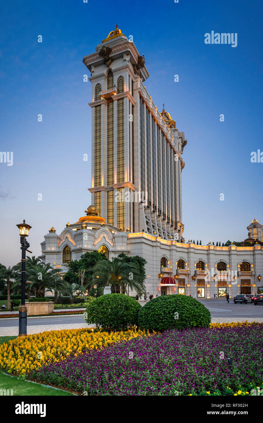 The Galaxy Hotel exterior architecture illuminated at night in Macau ...