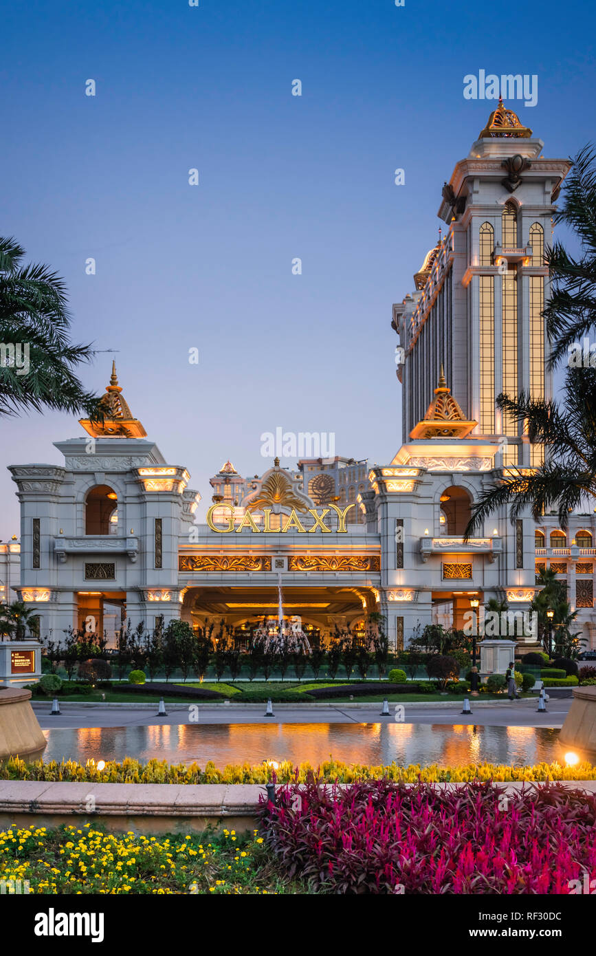 The Galaxy Hotel exterior architecture illuminated at night in Macau ...
