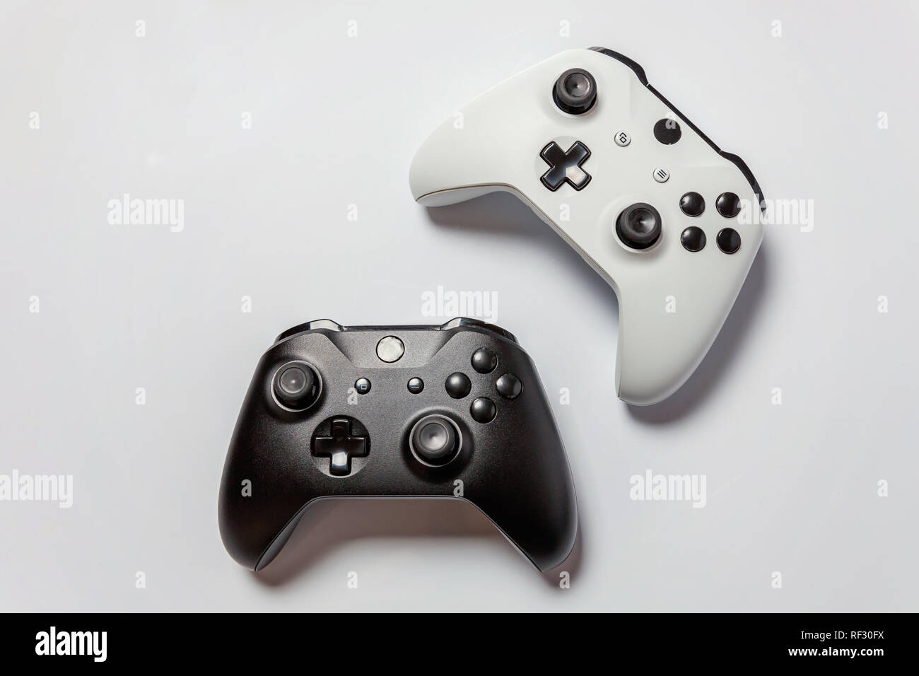 White and black two joystick gamepad, game console isolated on white ...