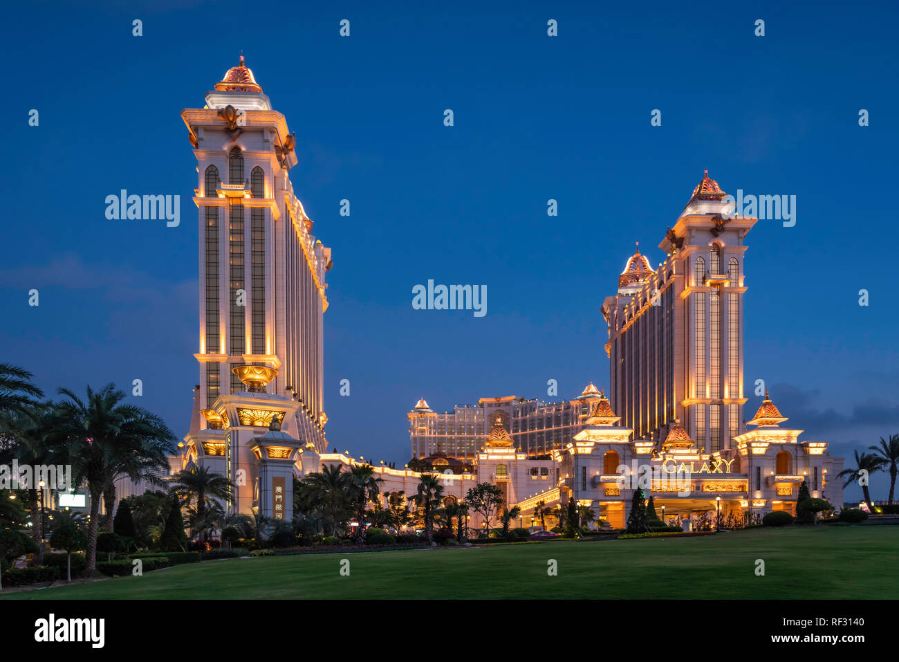 The Galaxy Hotel exterior architecture illuminated at night in Macau ...