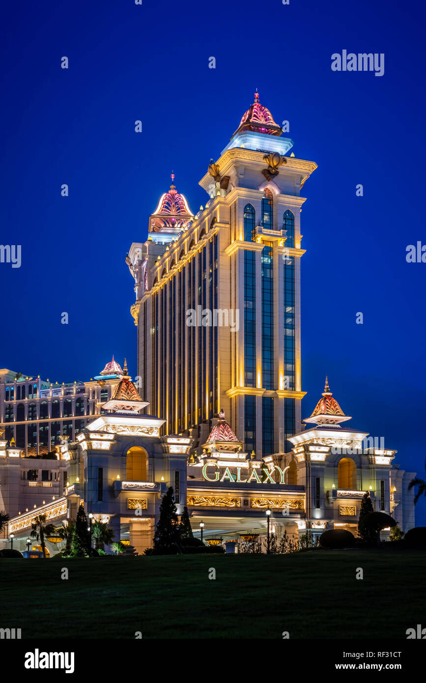 The Galaxy Hotel exterior architecture illuminated at night in Macau ...