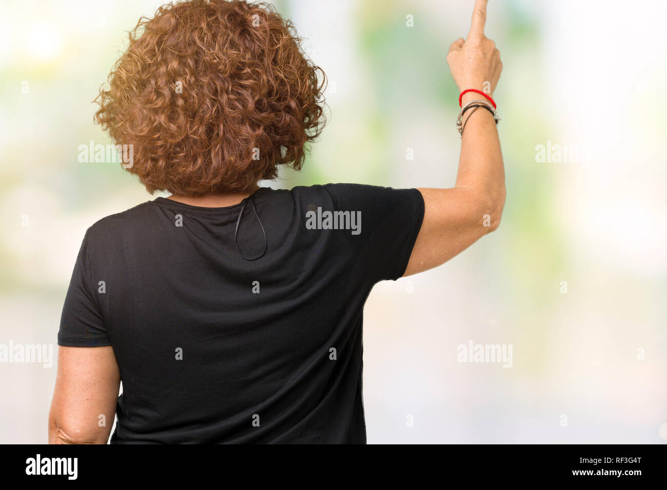 Beautiful middle ager senior woman over isolated background Posing ...