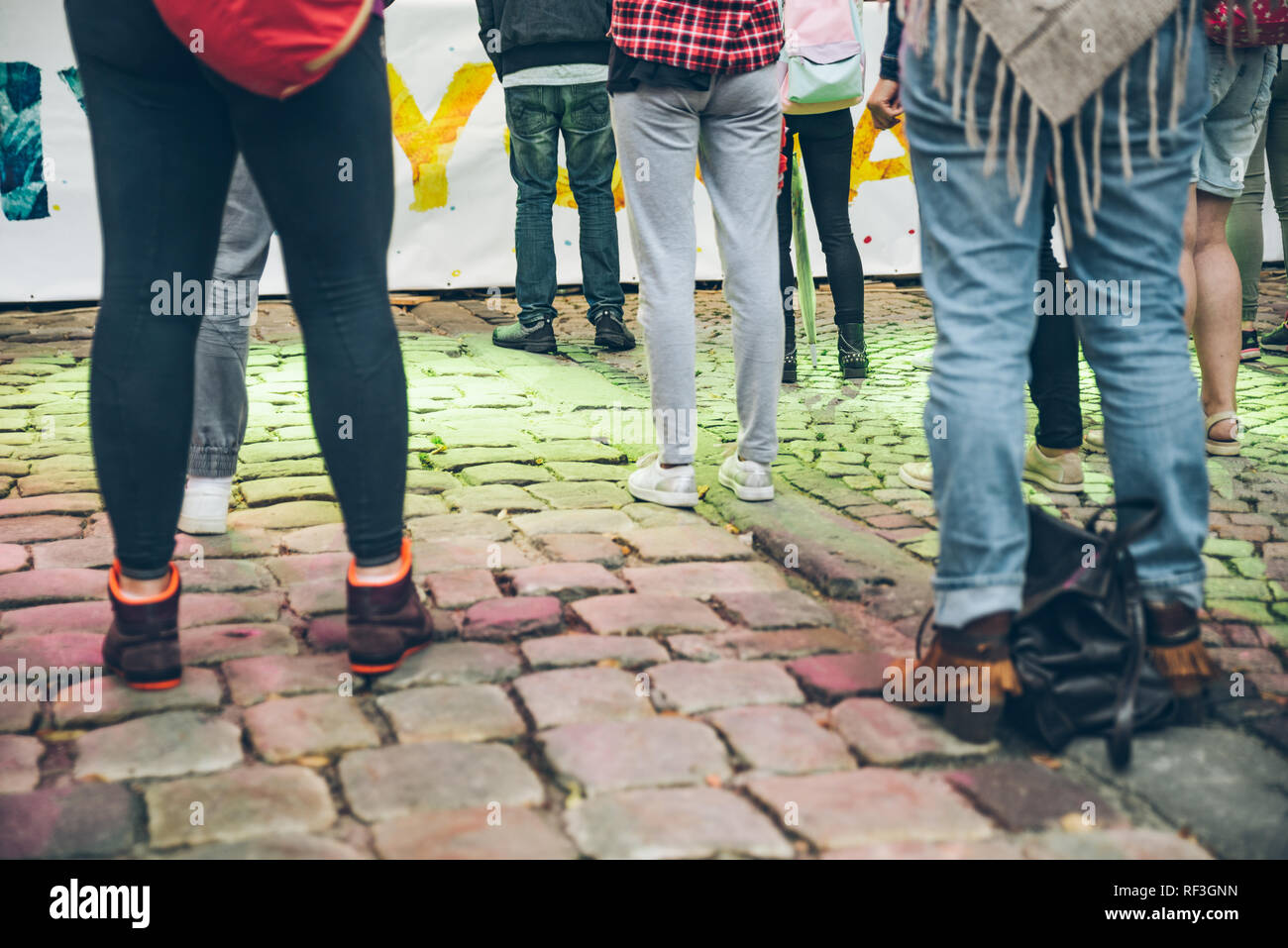 people standing at concert. legs close up. lifestyle Stock Photo - Alamy