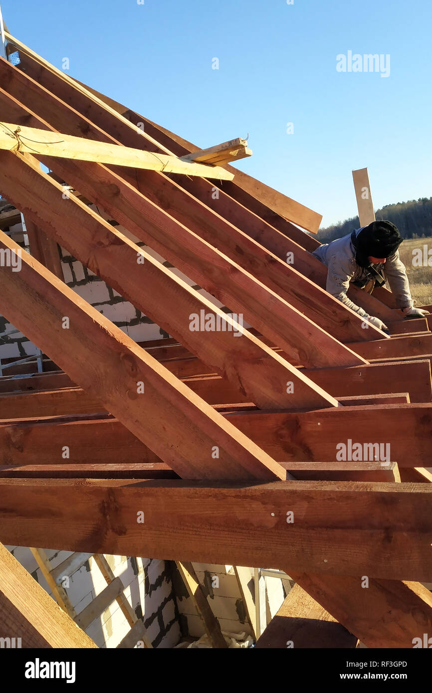 Layout and installation of roof rafters on a new commercial residential ...