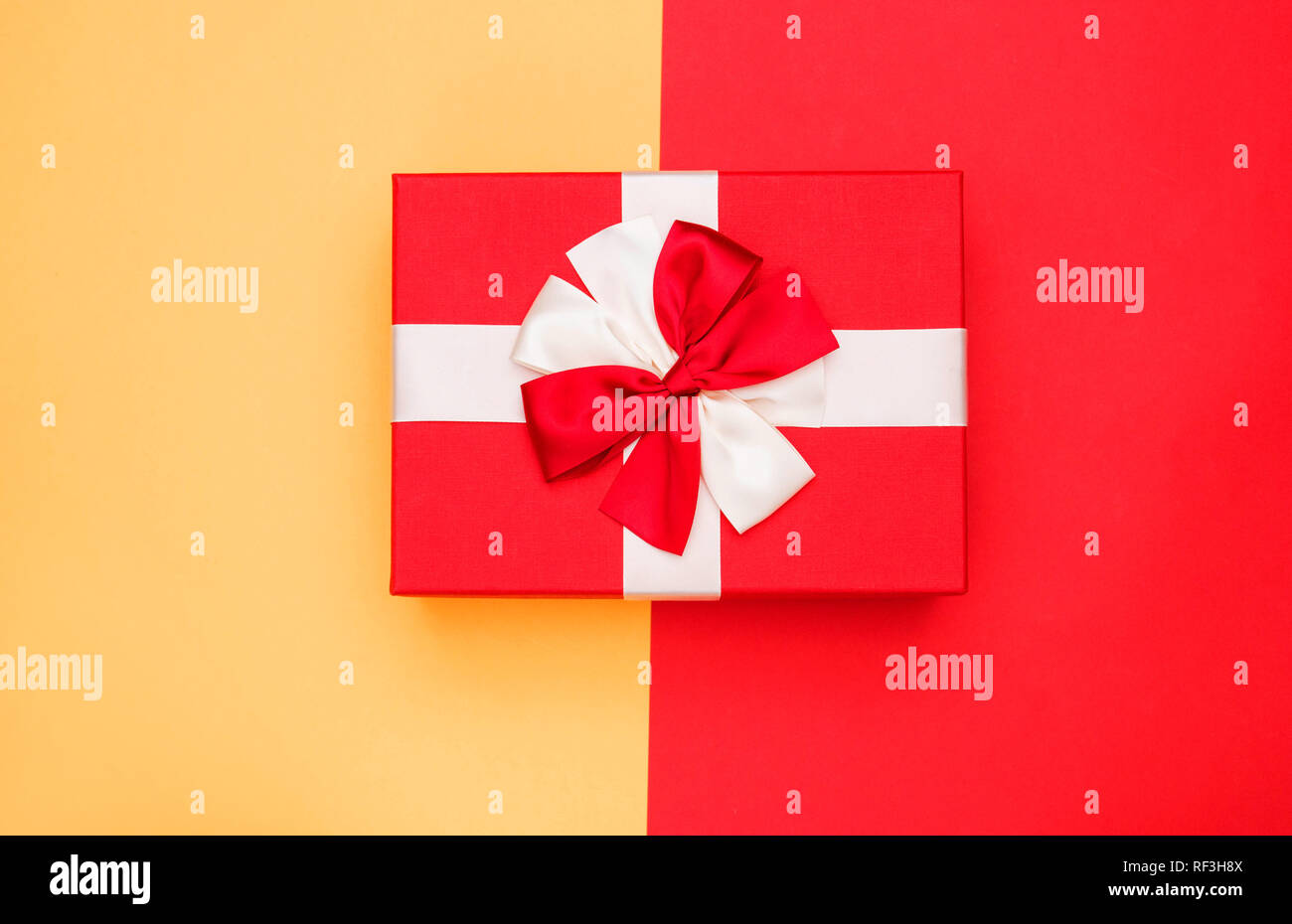 Real box with white and red bow and ribbon top view on Valentine's day ...