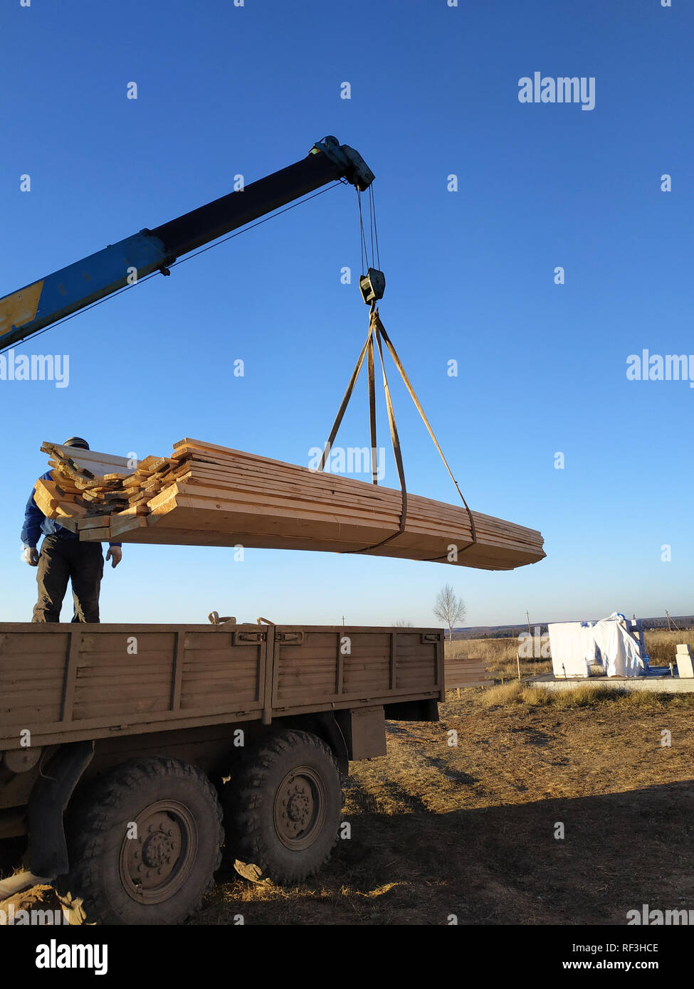 Crane lifting cement container construction hi-res stock photography ...