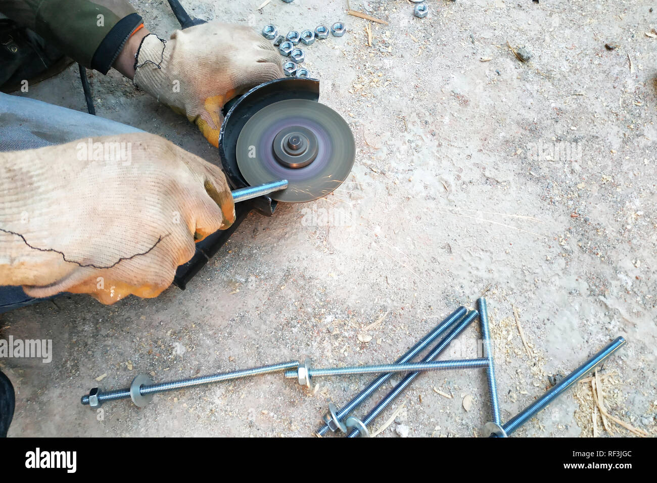 The master cuts and bolts the bolts using an angle grinder 2019 Stock ...