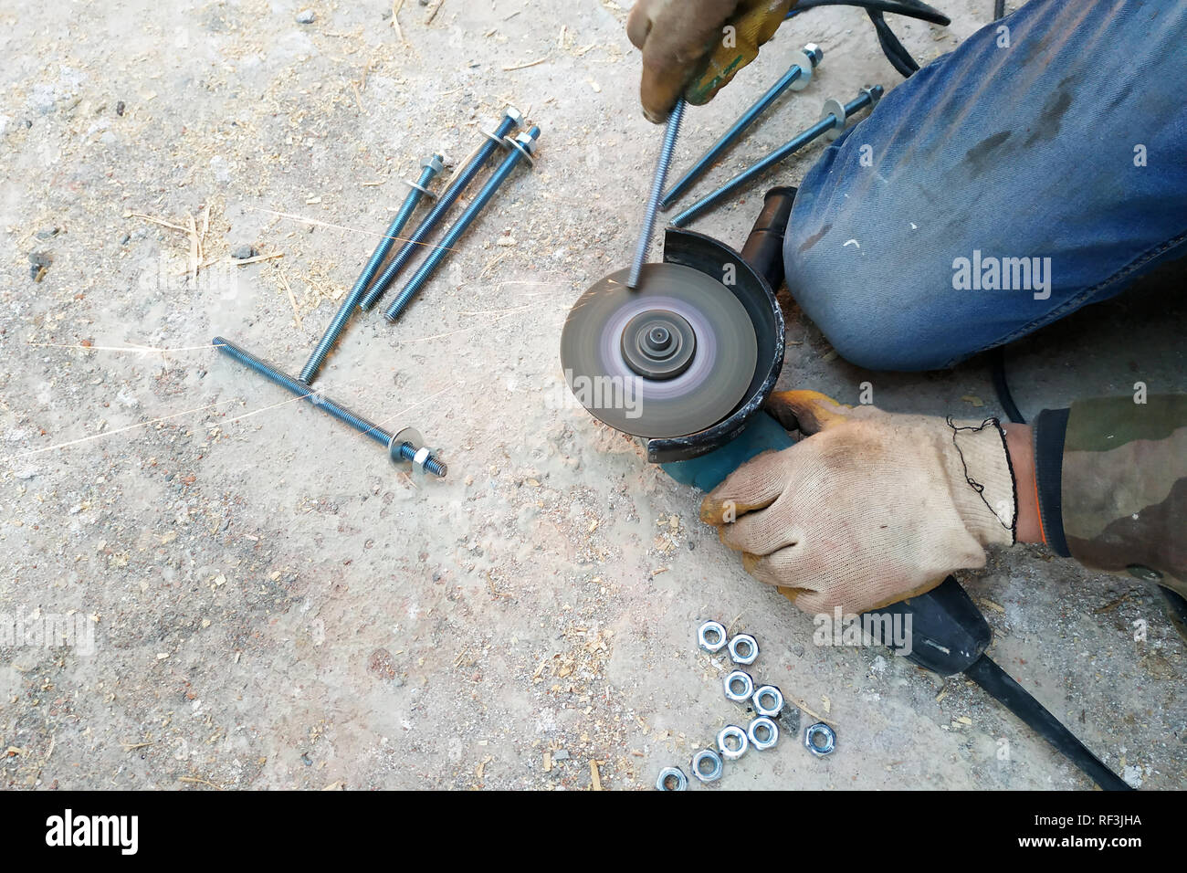 The master cuts and bolts the bolts using an angle grinder 2019 Stock ...