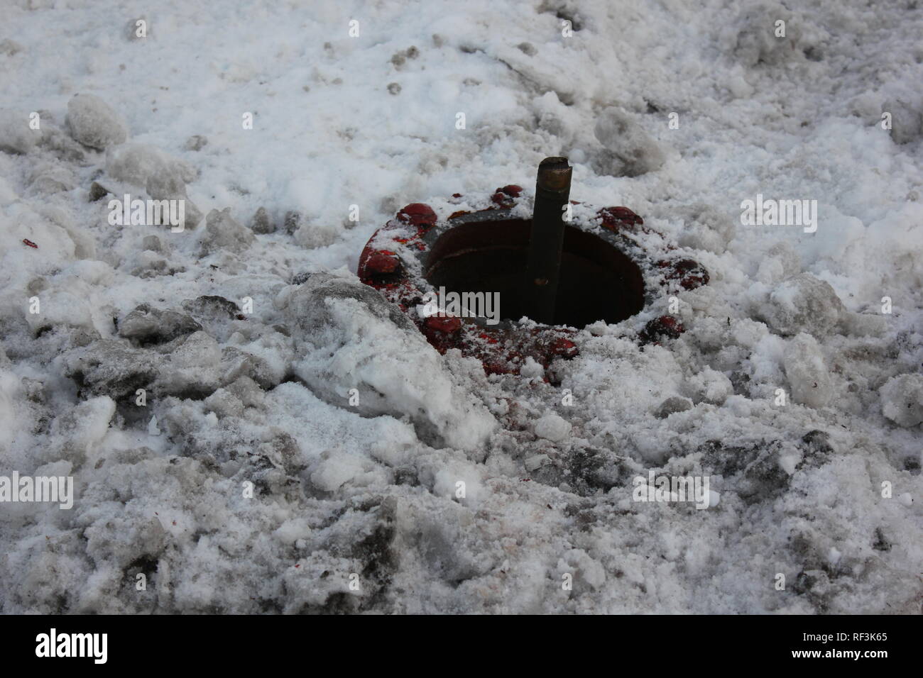 Broken fire hydrant that has been sheared off during a bad traffic ...