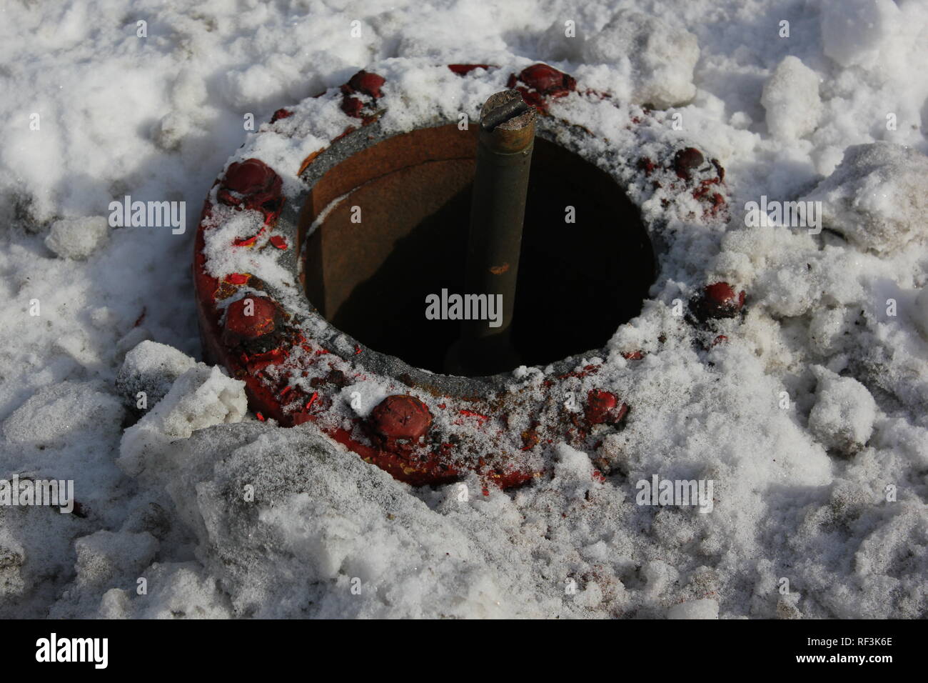 Broken fire hydrant that has been sheared off during a bad traffic ...
