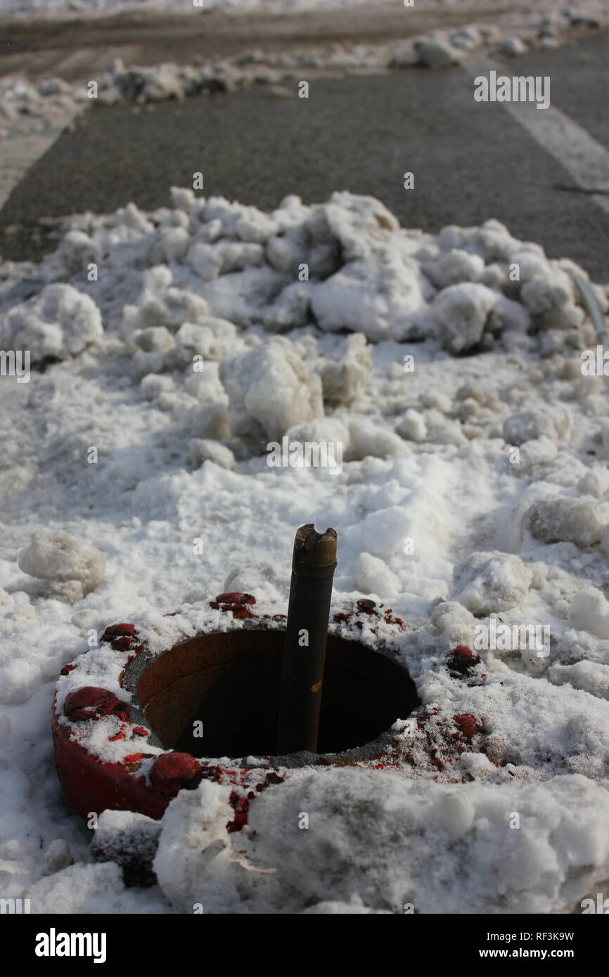 Broken fire hydrant that has been sheared off during a bad traffic ...