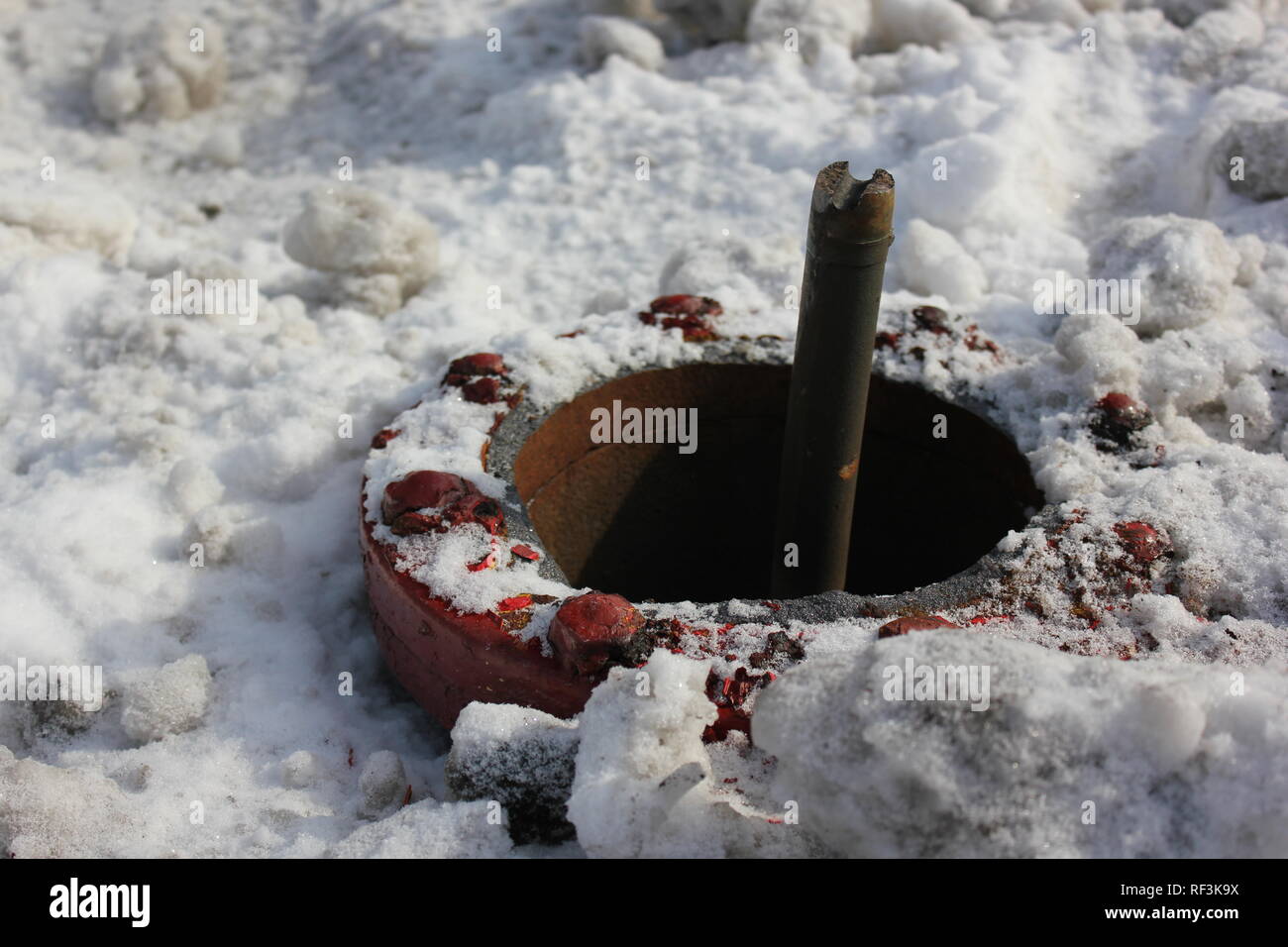 Broken fire hydrant that has been sheared off during a bad traffic ...