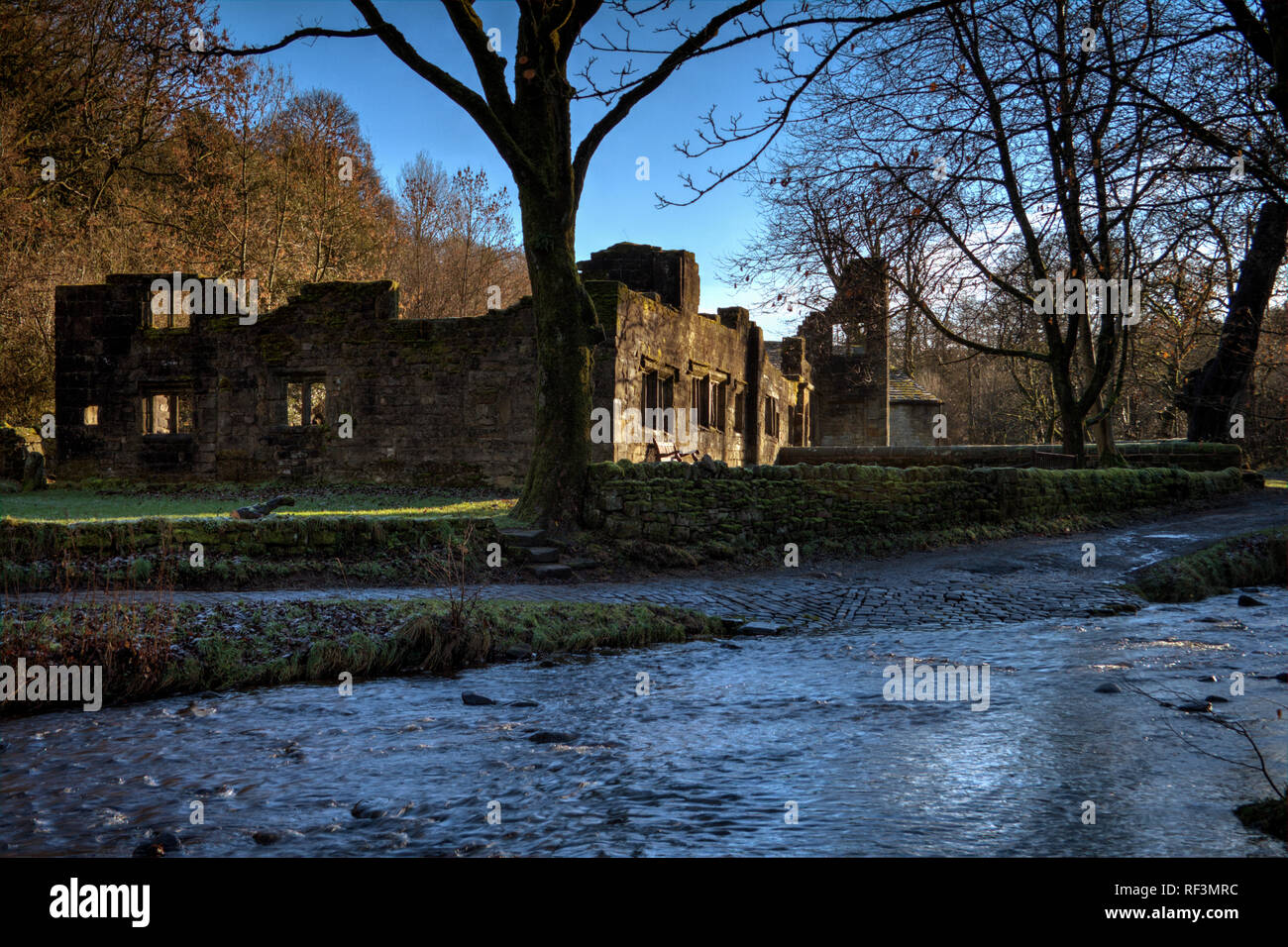 The ruins of Wycoller Hall, viewed from across Wycoller Beck Stock ...