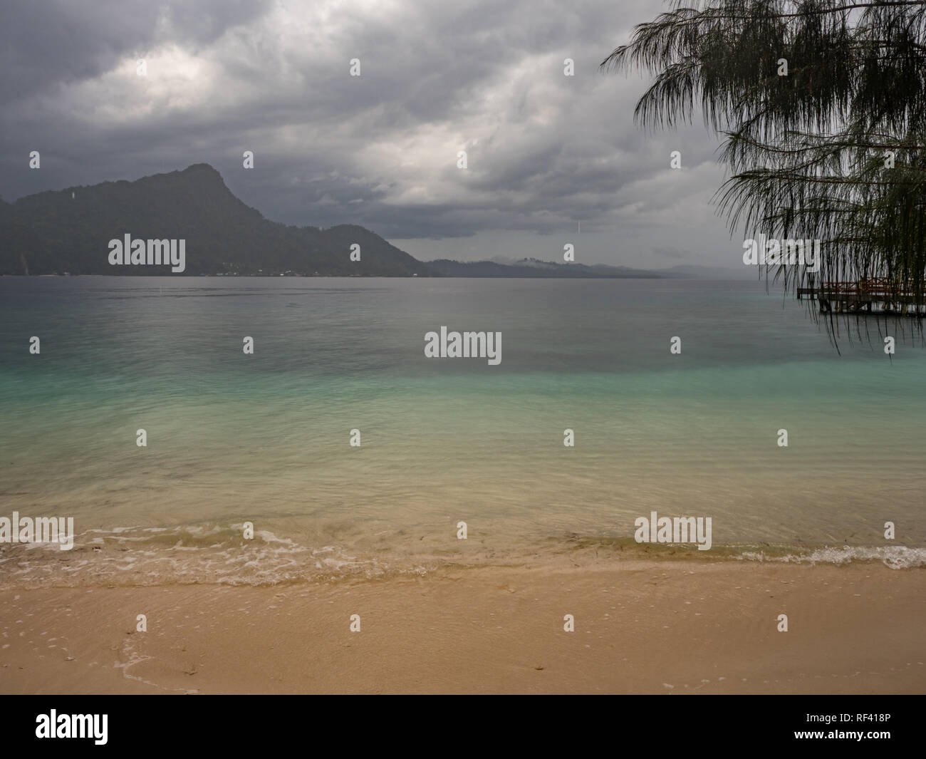 Beautiful tropical sea on the background of mountains, Seram island ...