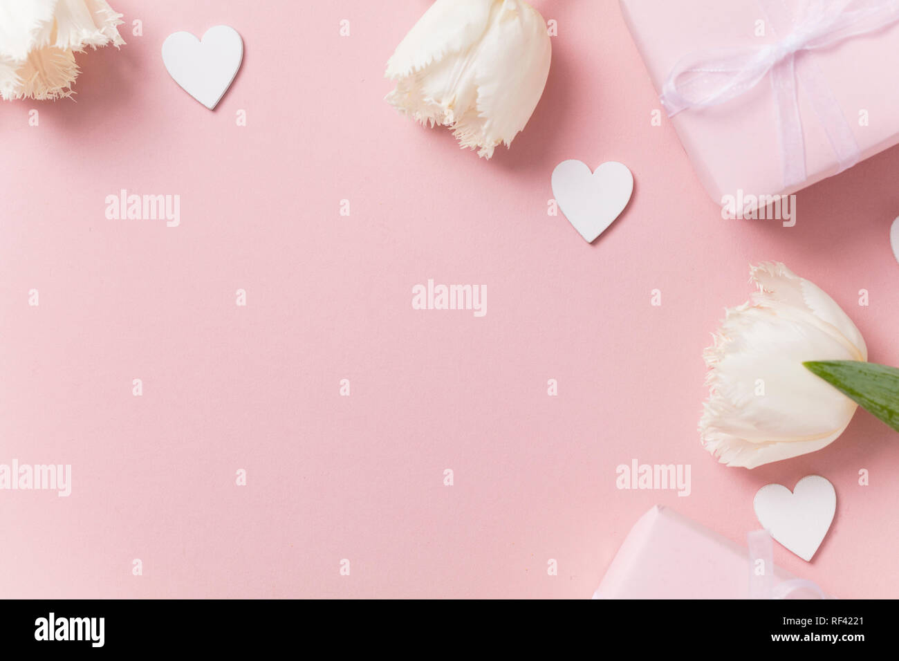 Valentine's day pink background, flowers and hearts Stock Photo - Alamy