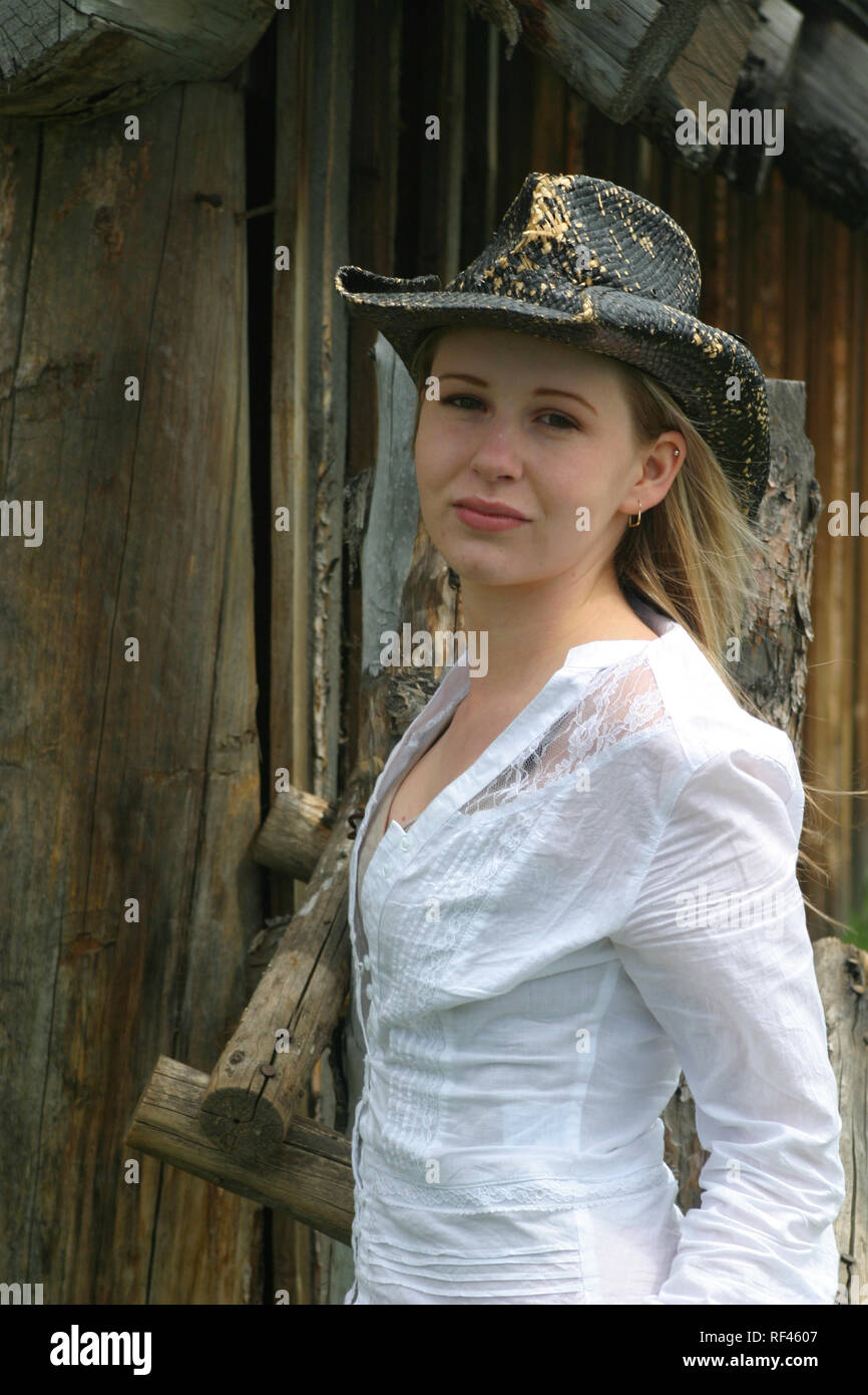 Pretty Caucasian blonde woman in a rural setting Stock Photo - Alamy