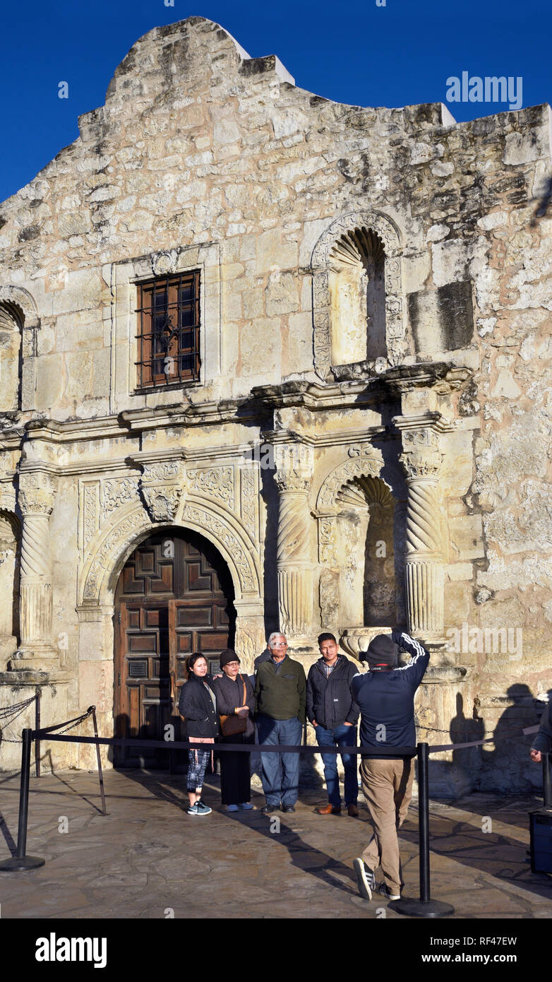 Tourists visit The Alamo Mission in San Antonio, Texas, USA commonly ...