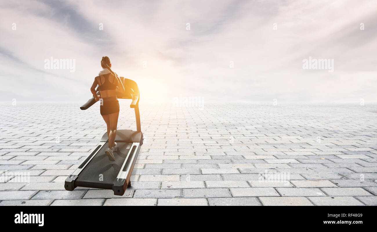 Back view girl on treadmill hi-res stock photography and images - Alamy