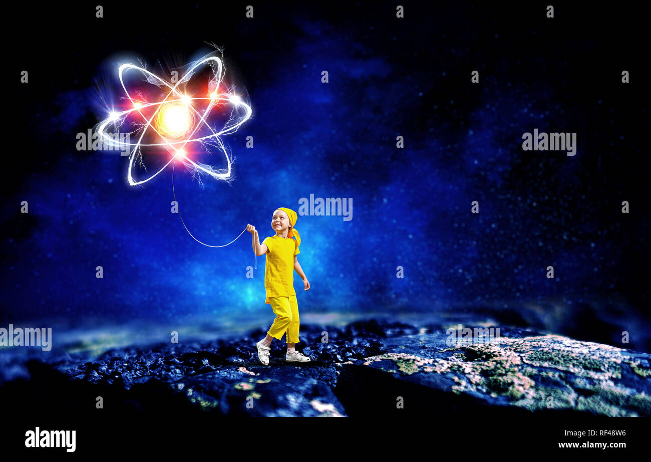 Cute kid girl with atom molecule balloon. Mixed media Stock Photo - Alamy