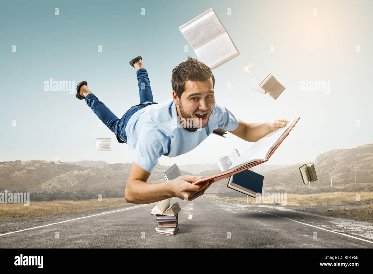 Funny guy with book in hands levitating in air. Mixed media Stock Photo ...