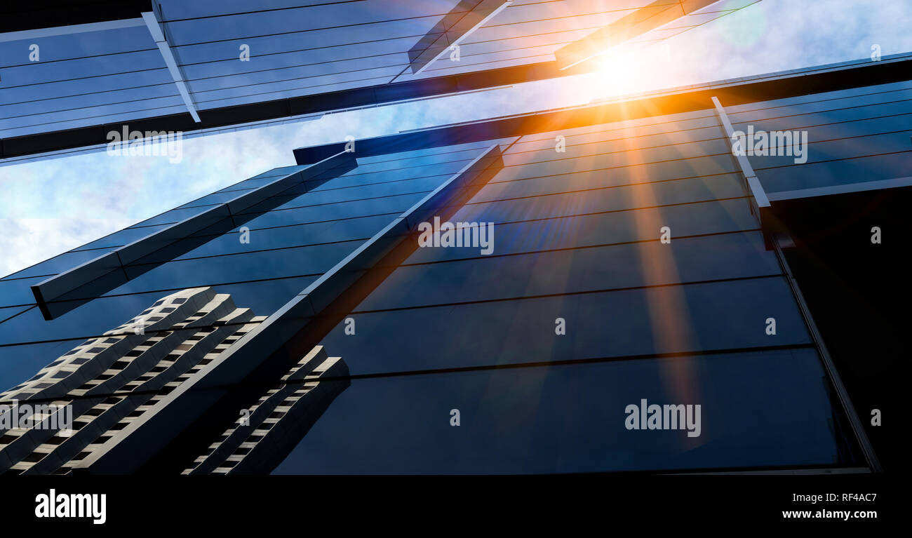 Bottom angle view of glass blue building Stock Photo - Alamy