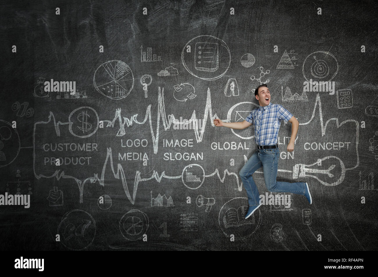 Top view of man lie on floor among drawn business sketches Stock Photo ...