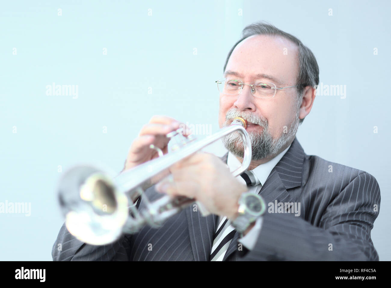 White hands playing a trumpet hi-res stock photography and images - Alamy