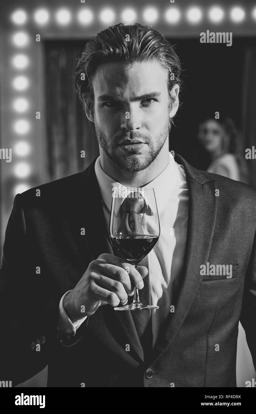man hold wine glass, sommelier Stock Photo - Alamy