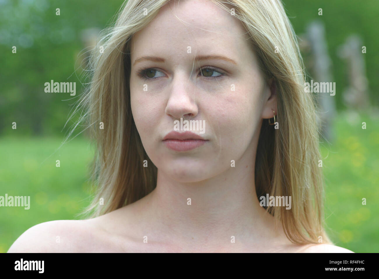 Pretty Caucasian blonde woman in a rural setting Stock Photo - Alamy