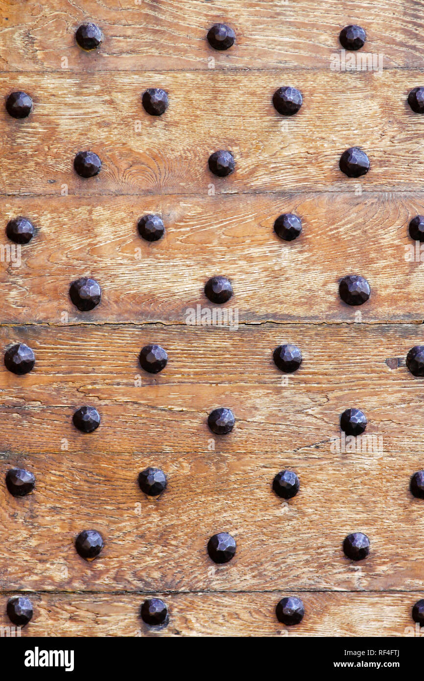 Medieval pattern made from wood with iron pins Stock Photo - Alamy