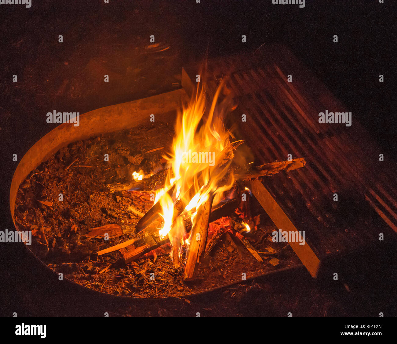 Camp fire in US Forest Service Campground, Oregon, USA Stock Photo - Alamy