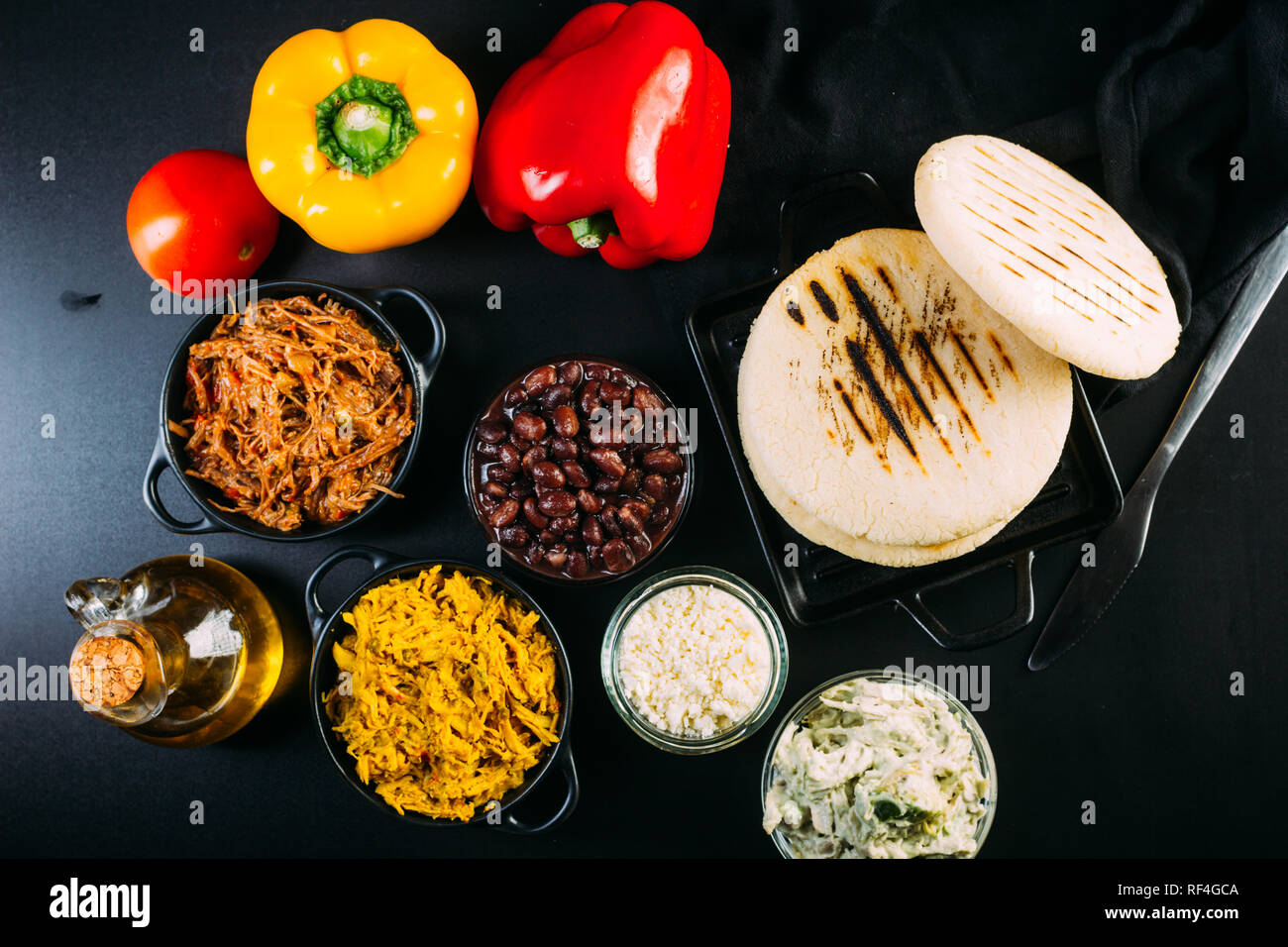 Top view of South American food called arepa and different ingredients ...